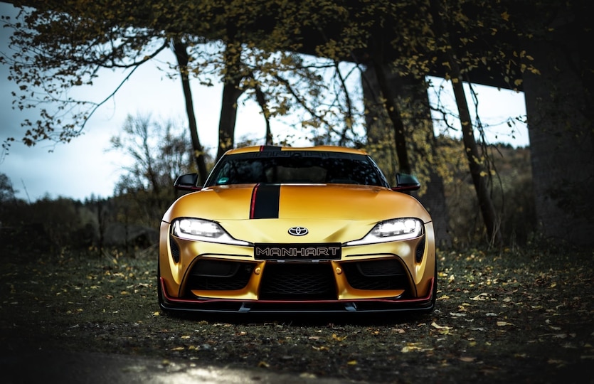 Toyota Supra gr 550 firmata Manhart: potenza e look dorato | Auto.it